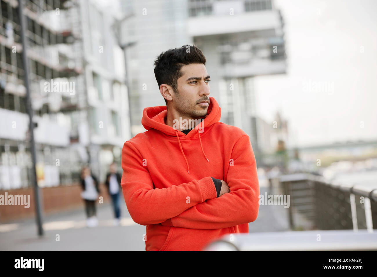 Person in red jacket hi-res stock photography and images - Alamy