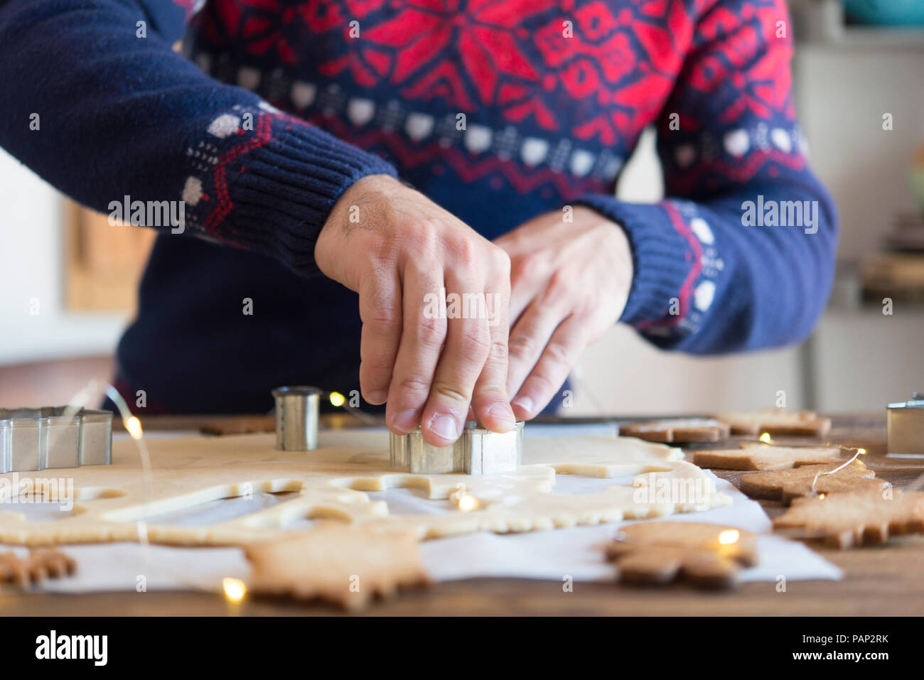 Making christmas cookies with mold Stock Photo - Alamy