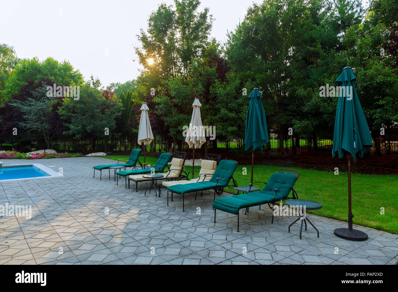 chair relax on in holiday swimming pool with clear blue water Stock ...