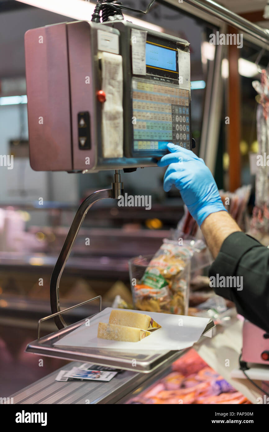 Weighing cheese hi-res stock photography and images - Alamy