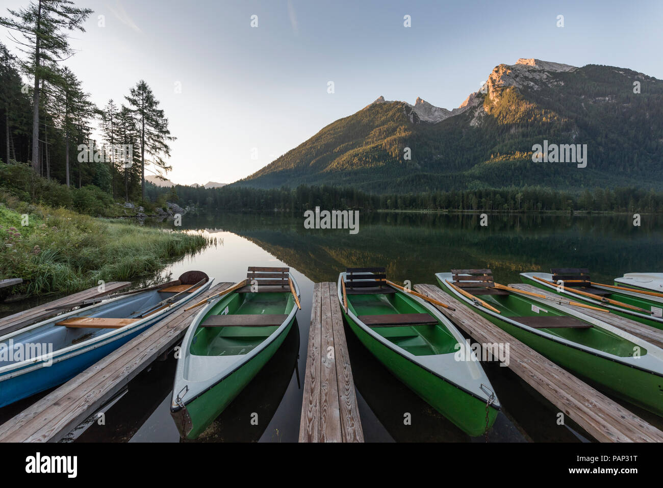 Mountain lake with rowing boats hi-res stock photography and images - Alamy