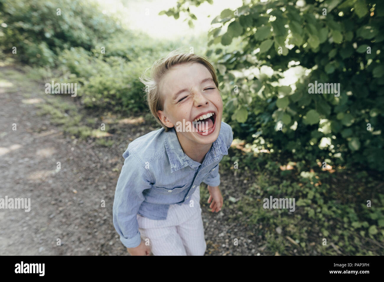 Laughing boy hi-res stock photography and images - Alamy