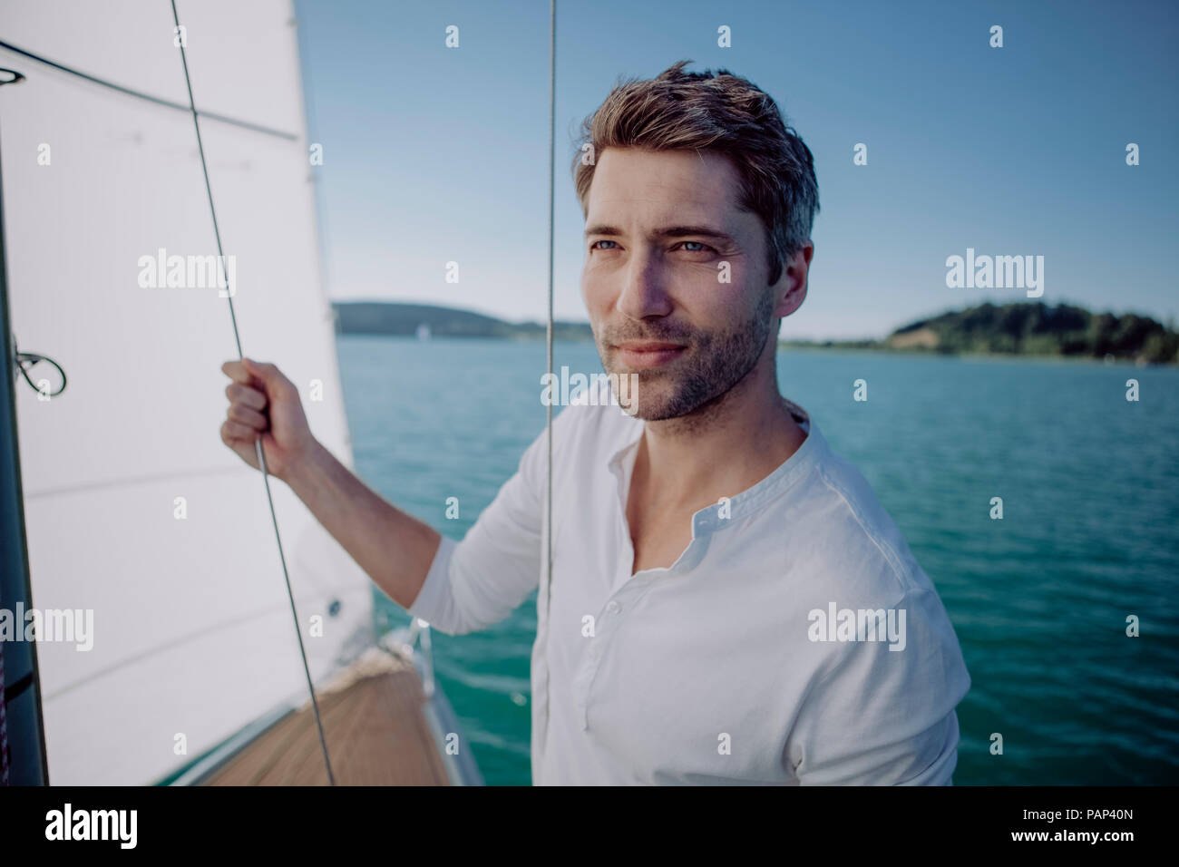 Man sailing boat hi-res stock photography and images - Alamy