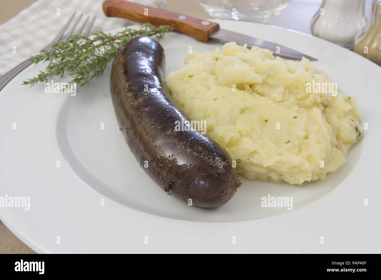 mashed potatoes and black pudding Stock Photo - Alamy