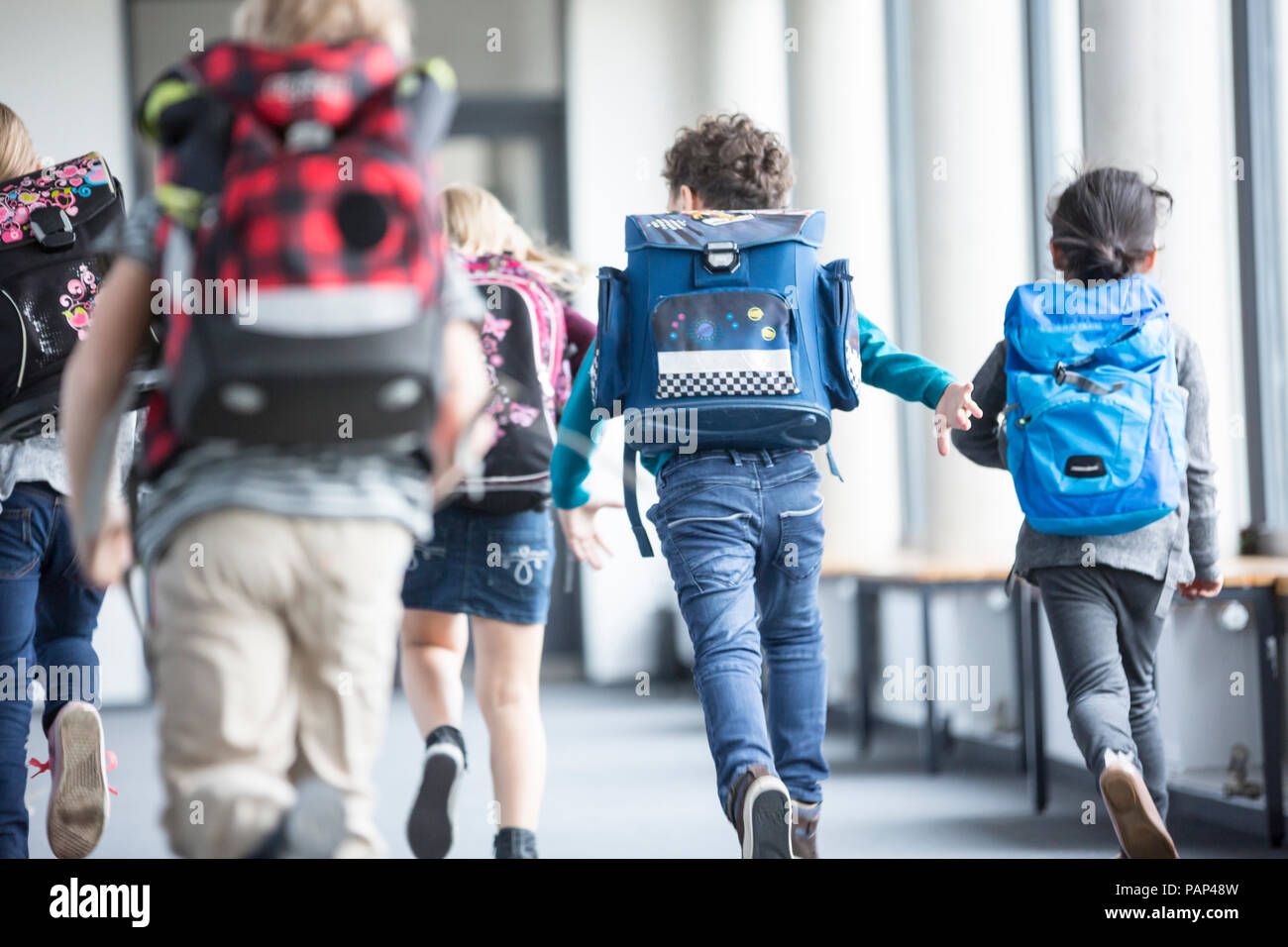 School pupils kids rushing school hi-res stock photography and images ...