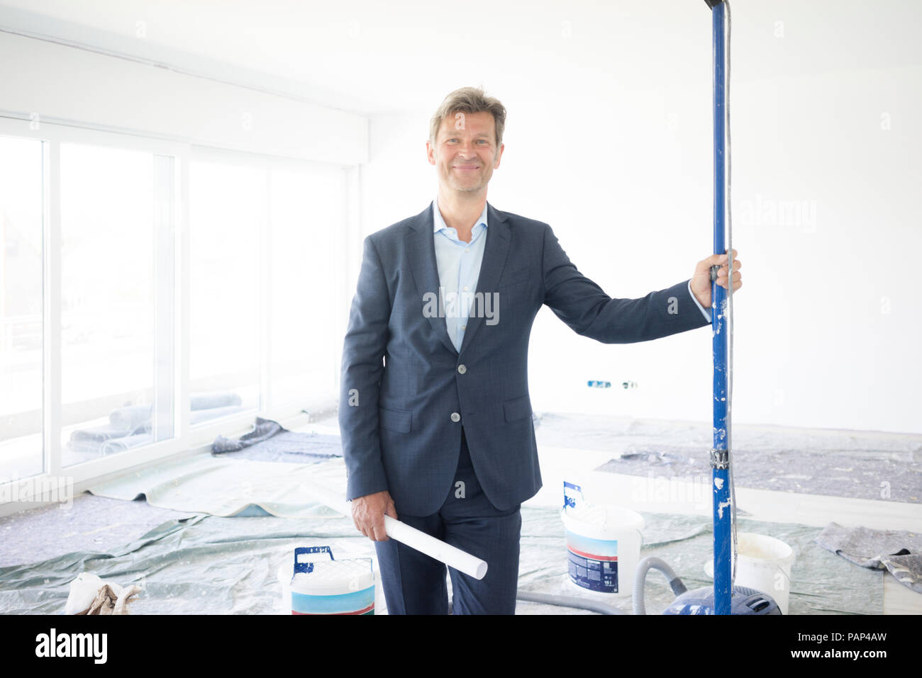 Portrait of smiling architect in building under construction Stock ...