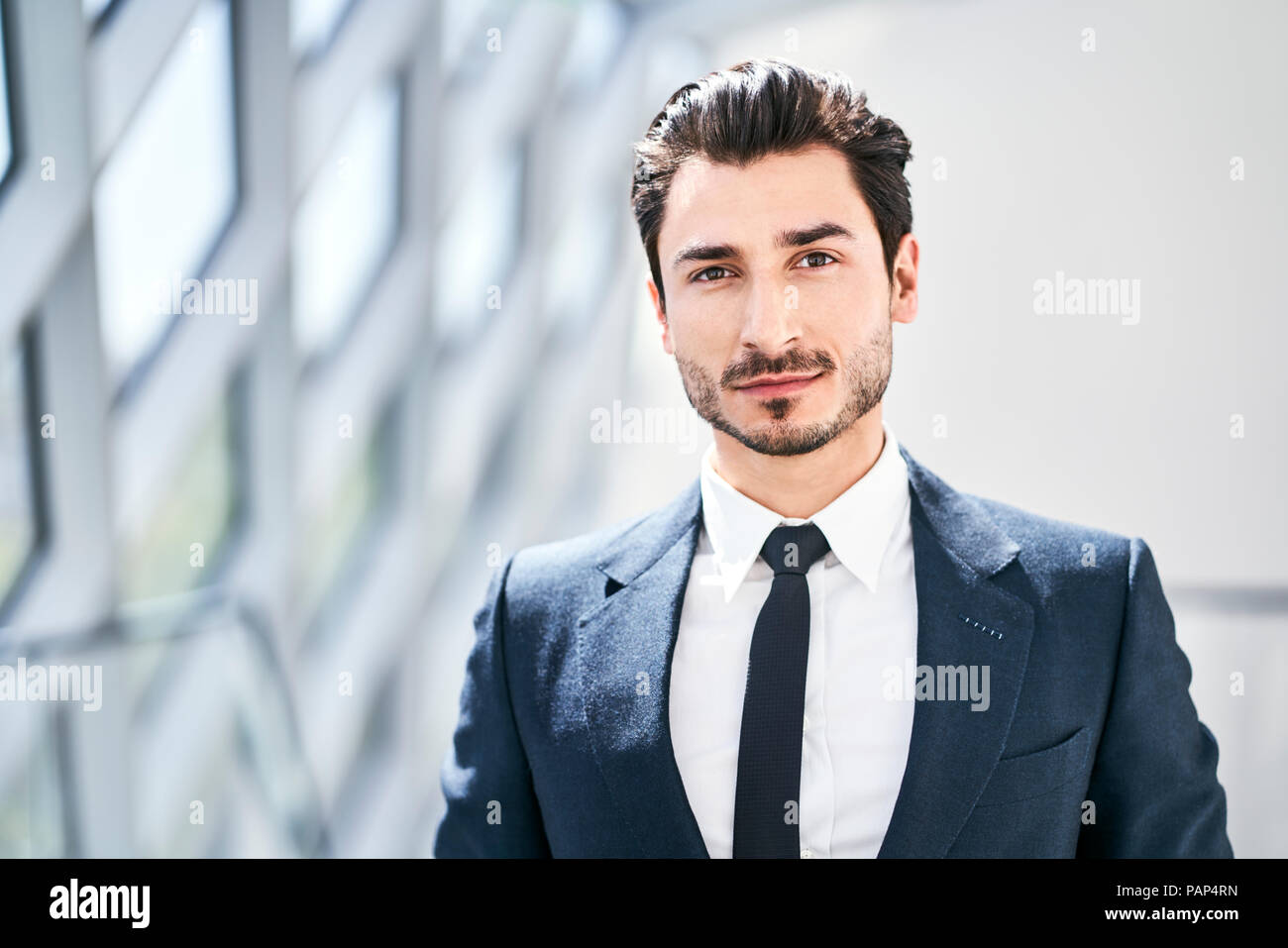 Confident businessman young businessman hi-res stock photography and ...