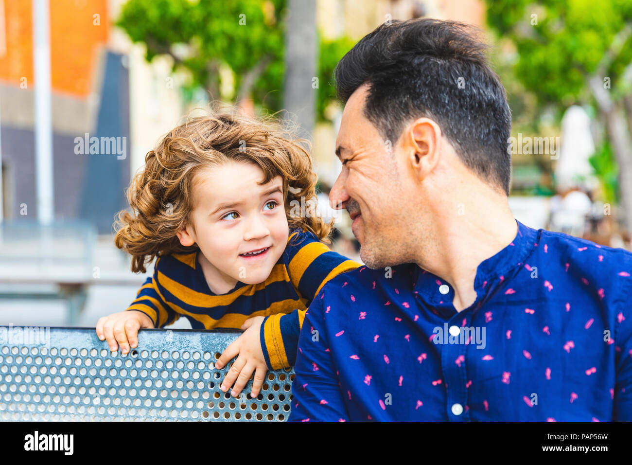 Father and son look at each other hi-res stock photography and images ...