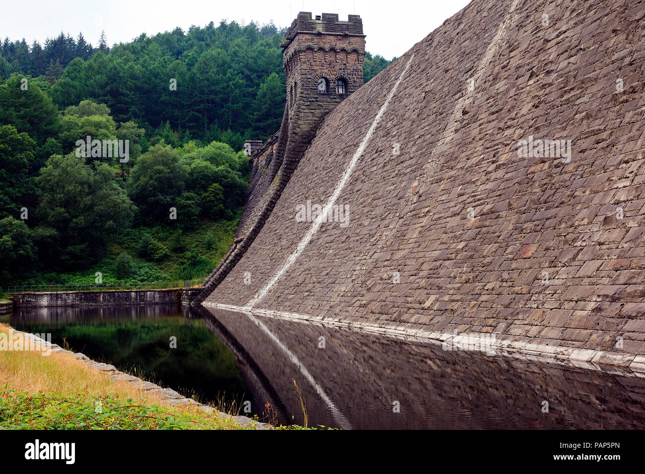 Base of the Derwent Reservoir Dam and West Tower in the Derbyshire Peak ...