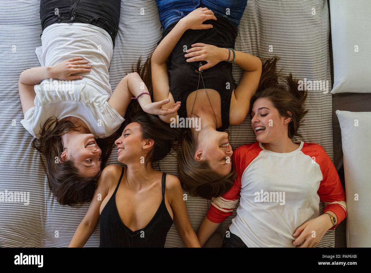 Four harmonious friends hi-res stock photography and images - Alamy