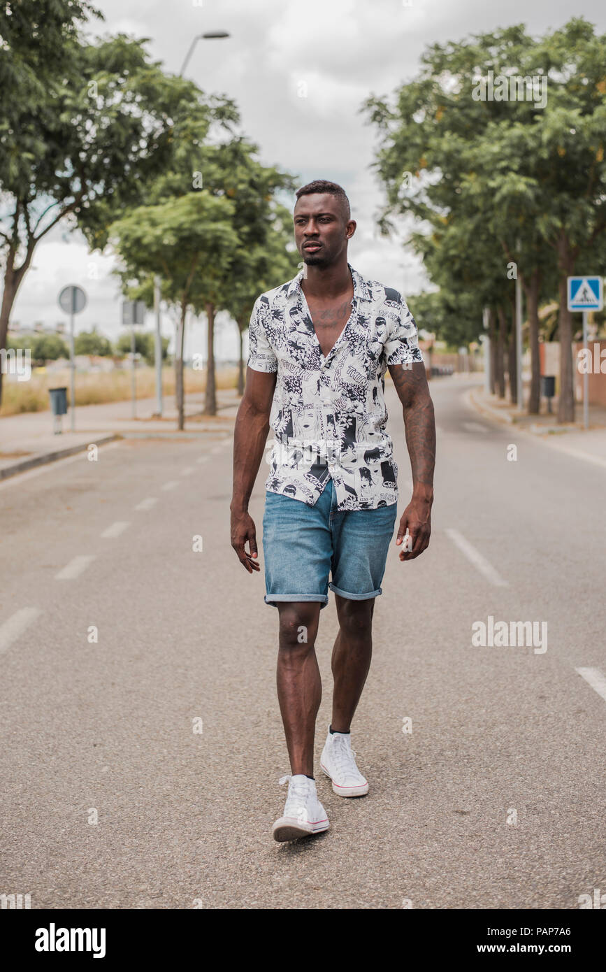 Man walking street hi-res stock photography and images - Alamy