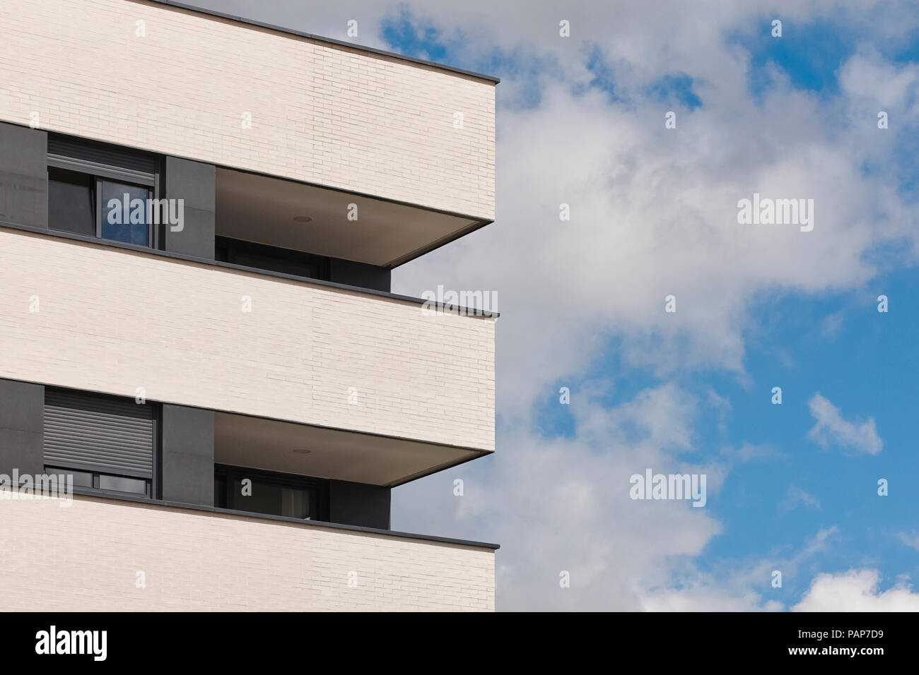 New building exterior facade with terrace. Construction. Buy, rent ...