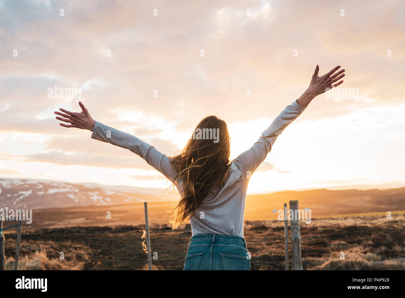 Female traveler arms raised hi-res stock photography and images - Alamy