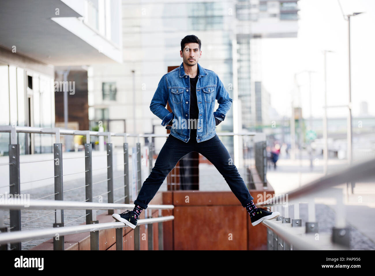 Germany, Cologne, young man at Rheinau harbour Stock Photo - Alamy