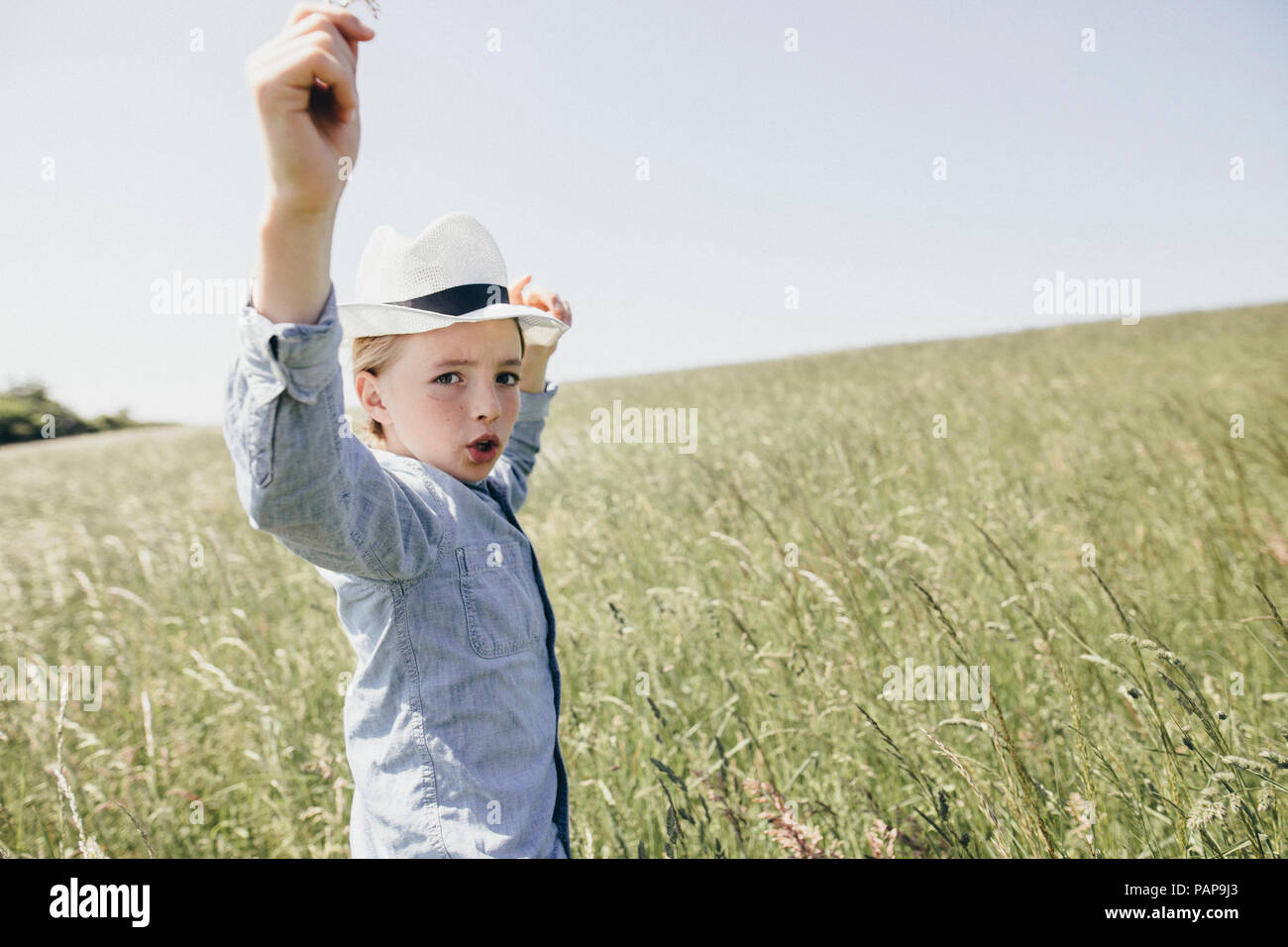 Boy wearing a hat hi-res stock photography and images - Alamy