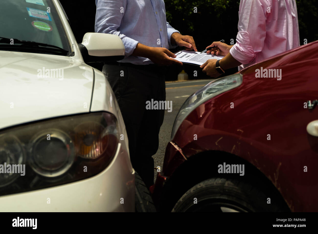 The insurance agent working claim process in payment on from parties ...