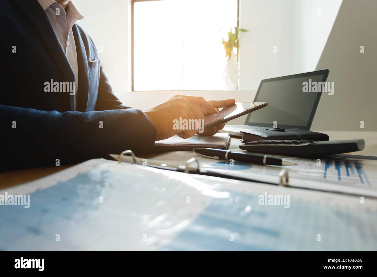 Business people using tablet to study data for business expansion ...