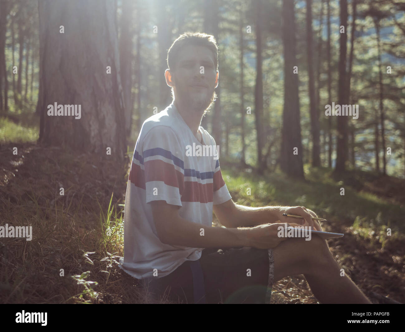 Man write book outdoor hi-res stock photography and images - Alamy