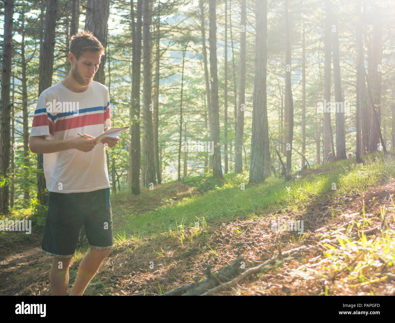 Man write book outdoor hi-res stock photography and images - Alamy