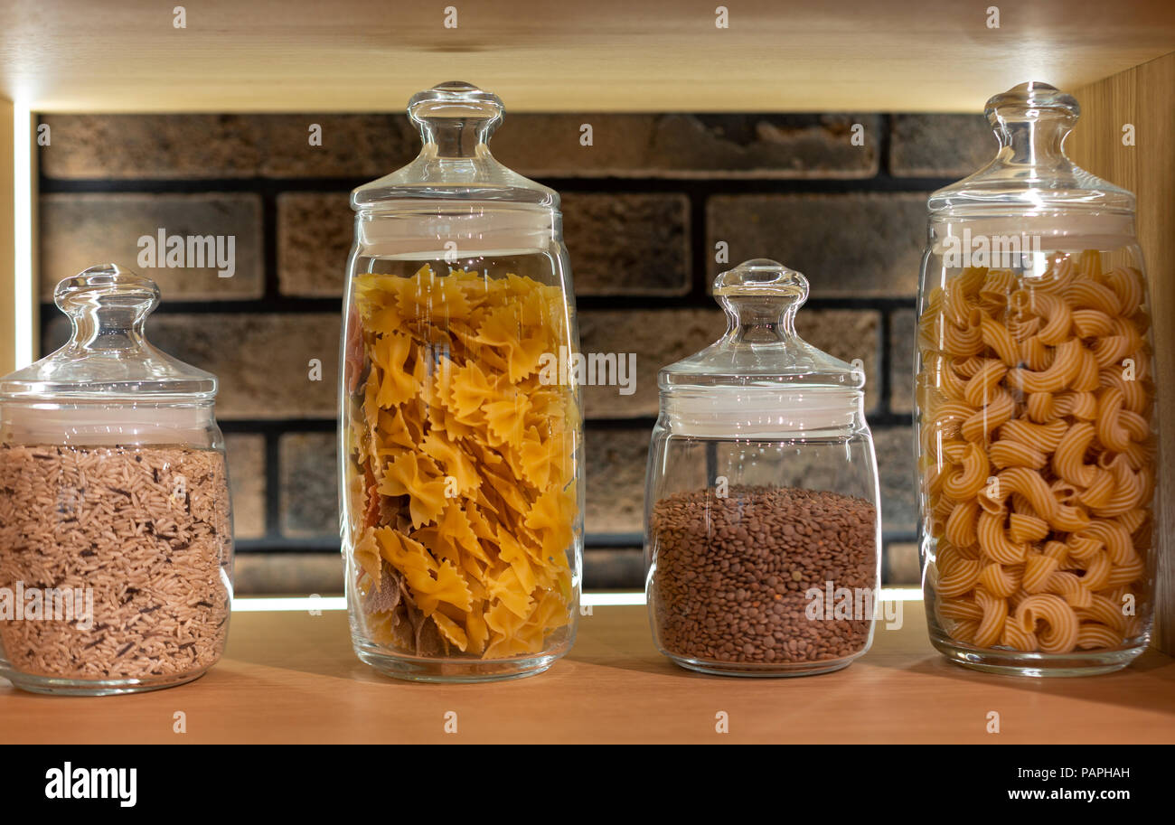pasta on a shelf in a glass jar in a modern interior Stock Photo - Alamy