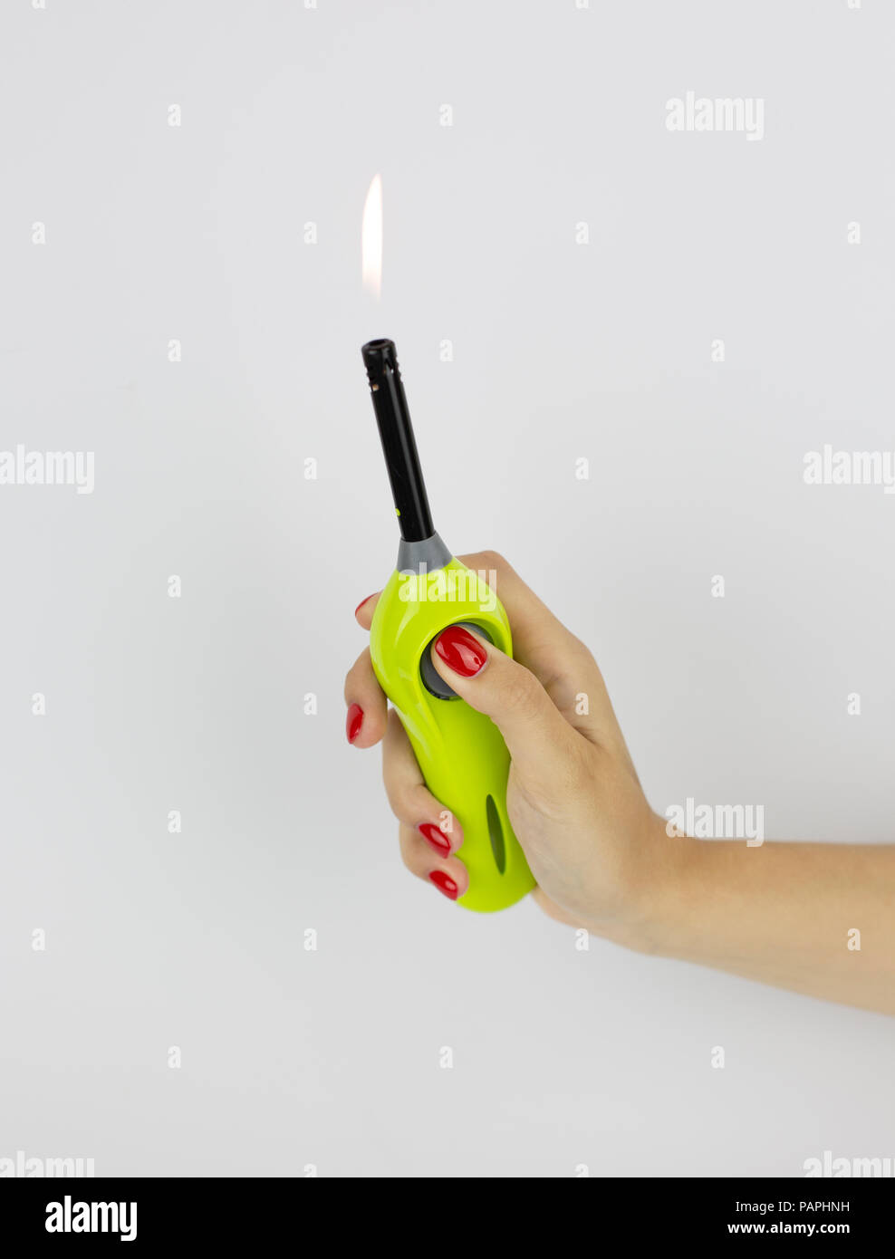 lighter with fire in woman's hand isolated on white background Stock ...