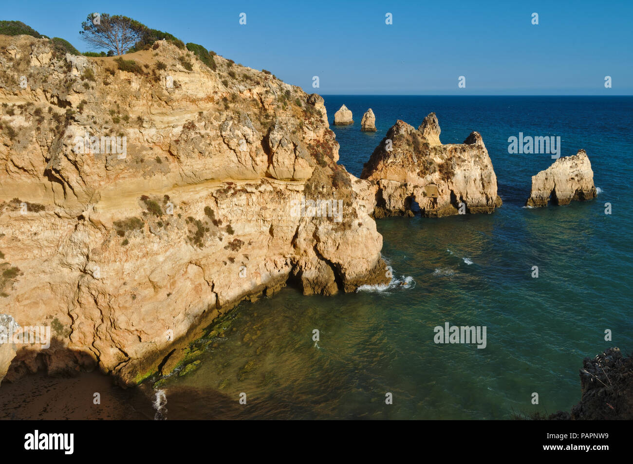 Praia dos Tres Irmaos (three brothers beach) in Algarve, Portugal Stock ...