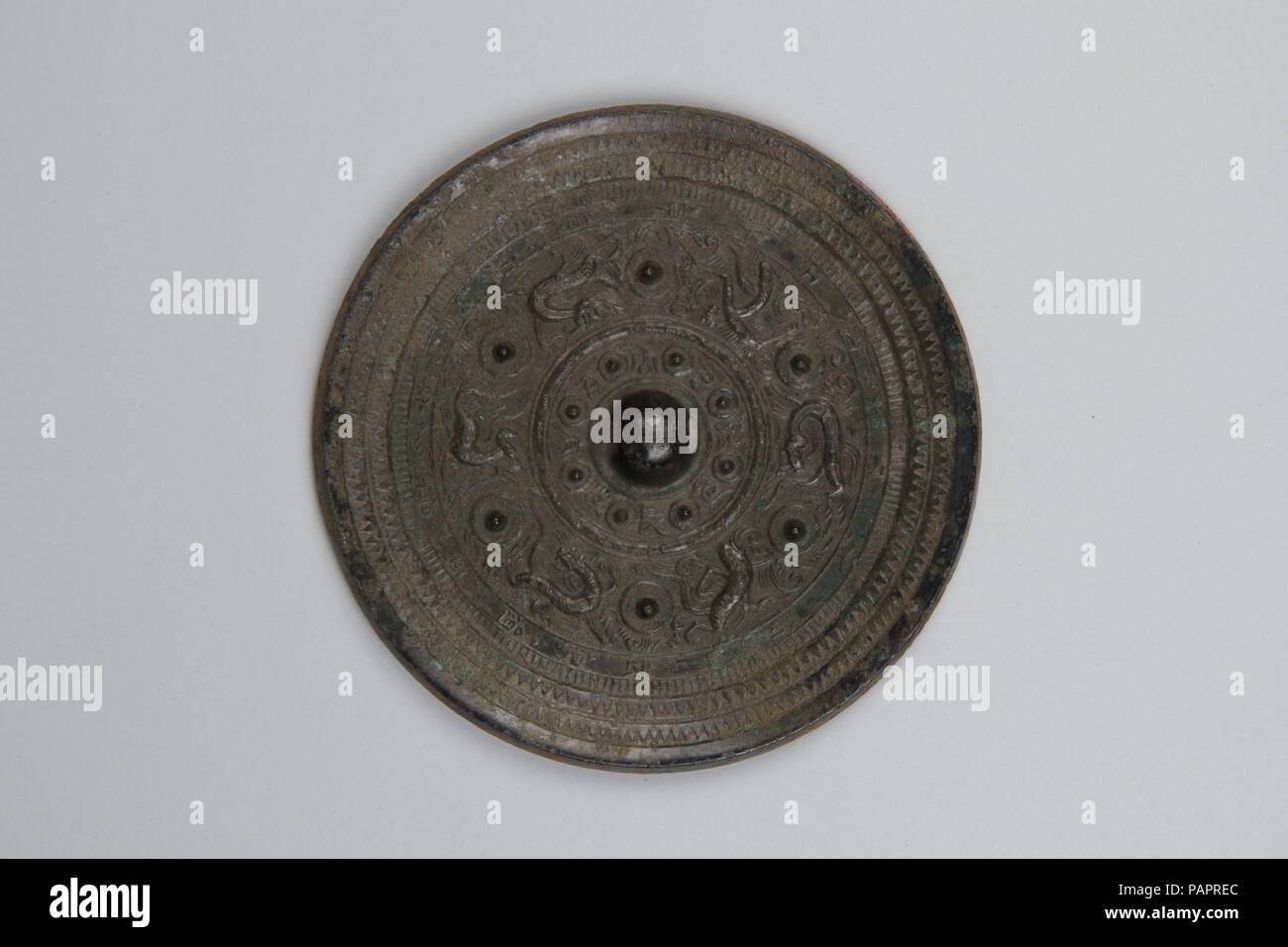 Mirror. Culture: China. Dimensions: Diam. 5 5/8 in. (14.3 cm). Museum ...