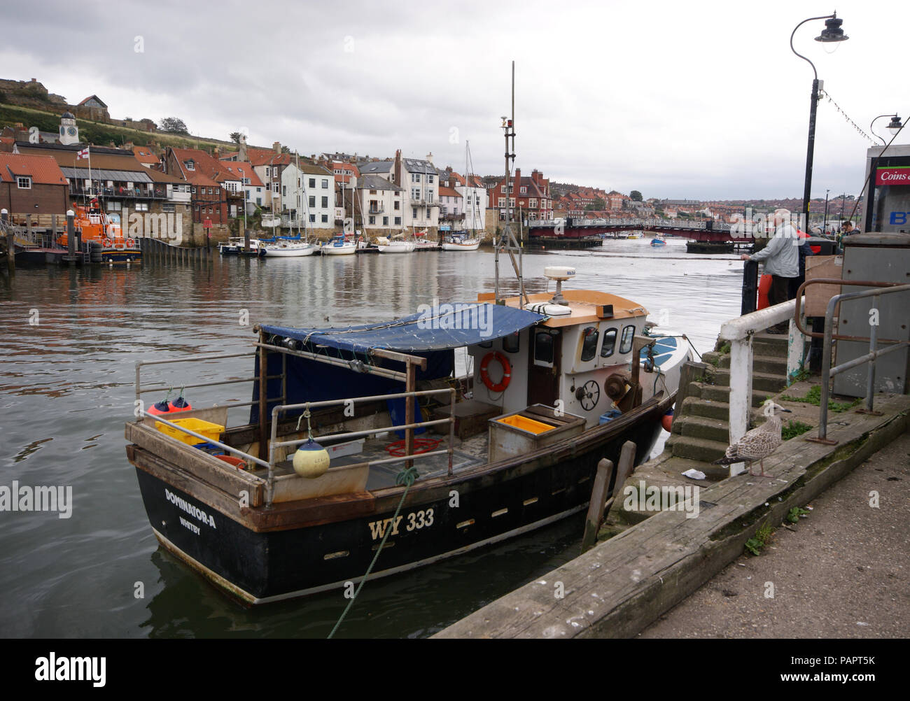 fishing boat on the quay at Whitby North Yorkshire Coast England Stock ...