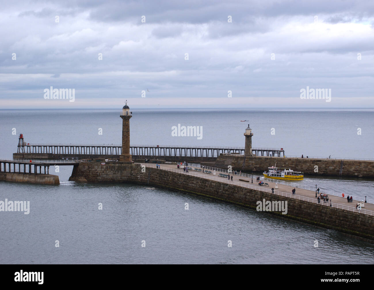 Whitby Lighthouse and Pier and Bridge England Stock Photo - Alamy