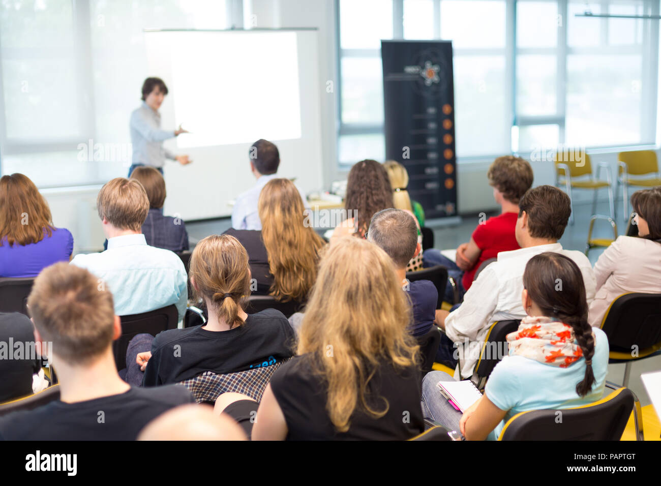 Speaker giving presentation on business conference Stock Photo - Alamy