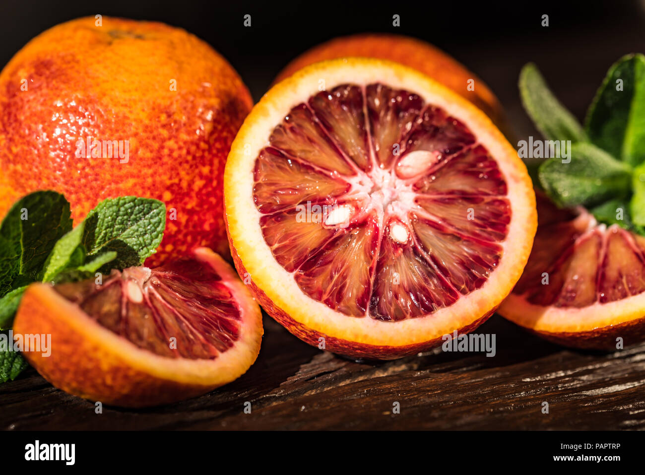 Whole and cut ripe juicy Sicilian Blood oranges Stock Photo - Alamy