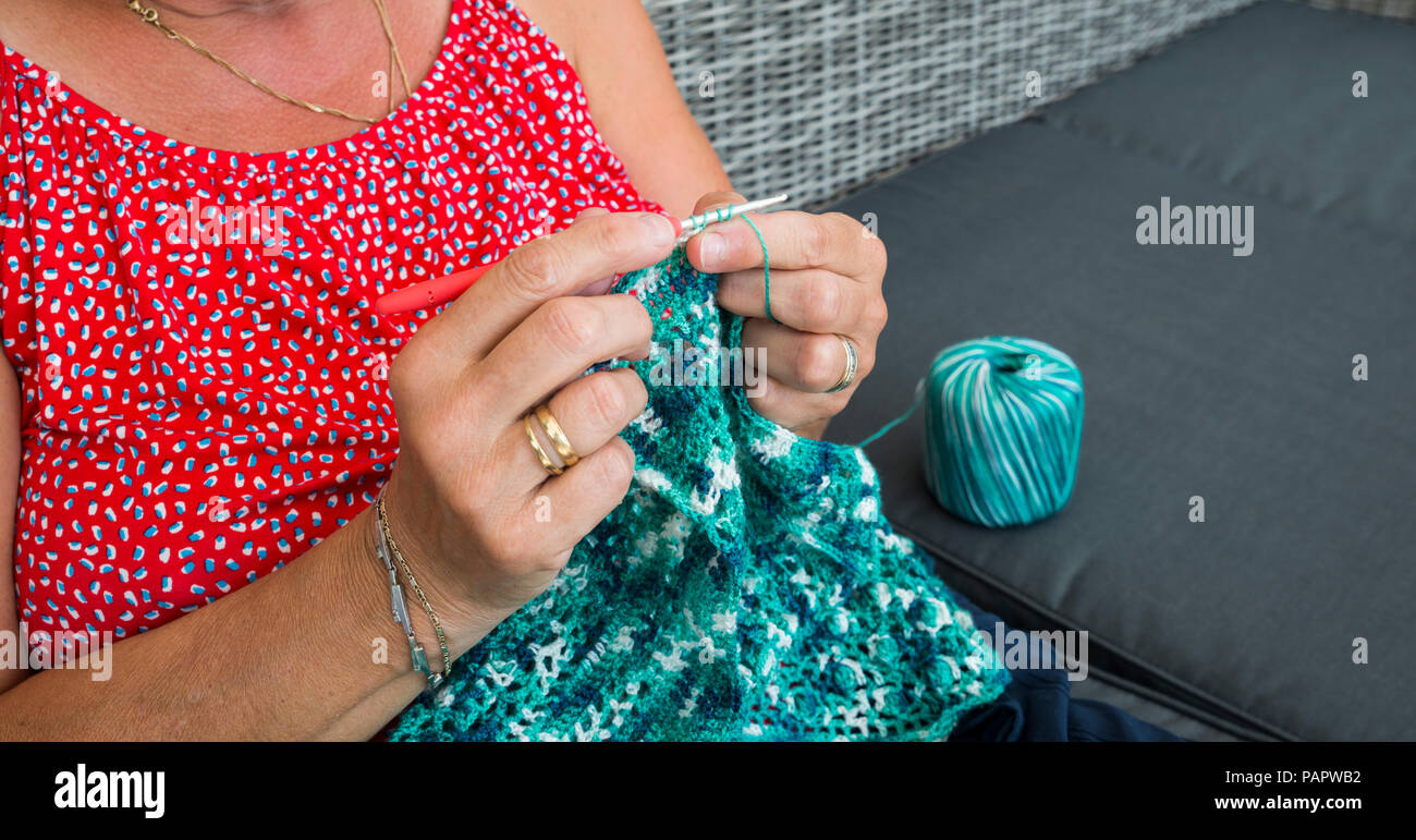 Woman crocheting hi-res stock photography and images - Alamy