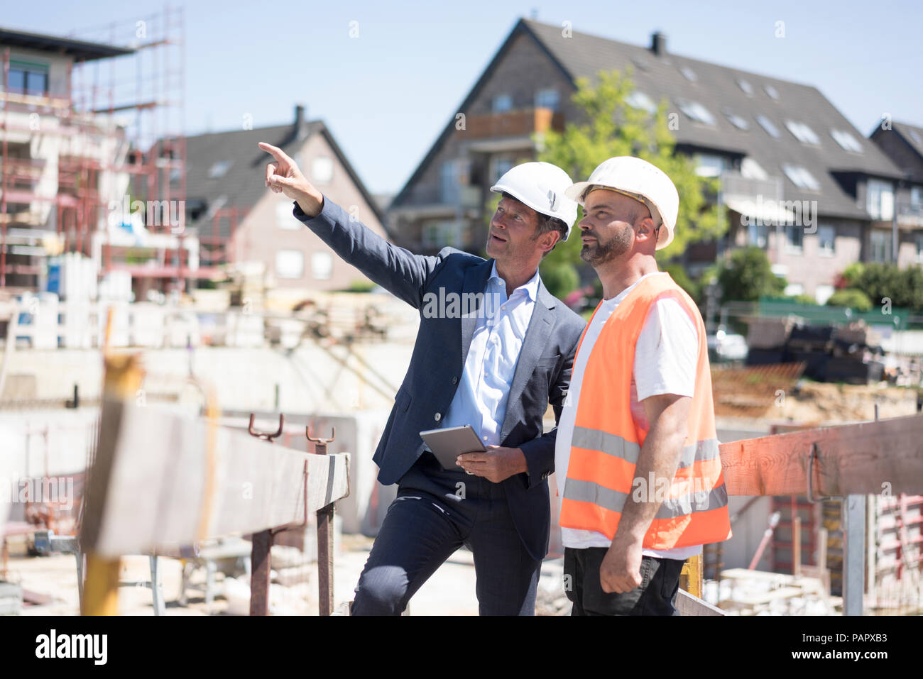 Construction talking hi-res stock photography and images - Alamy