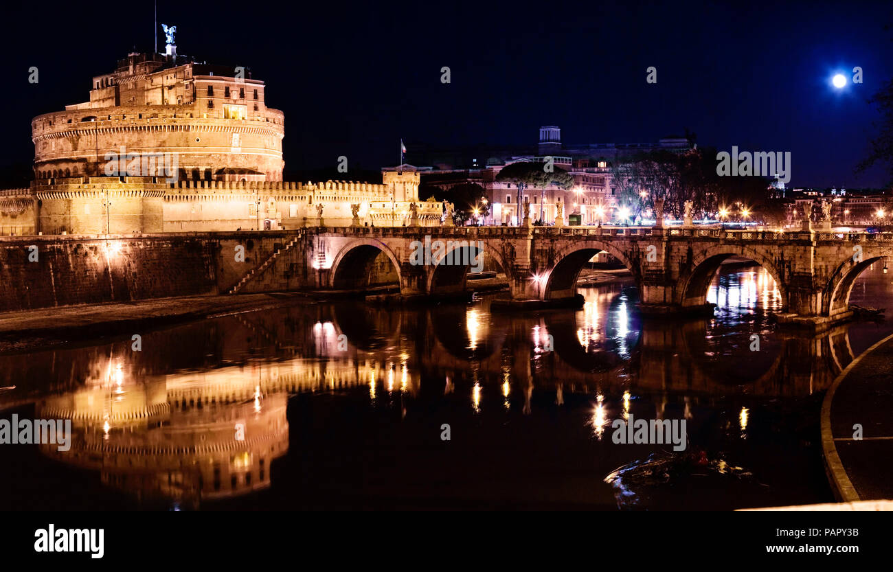 The Citadel towered above the river Tiber in the night, - Rome Italy ...