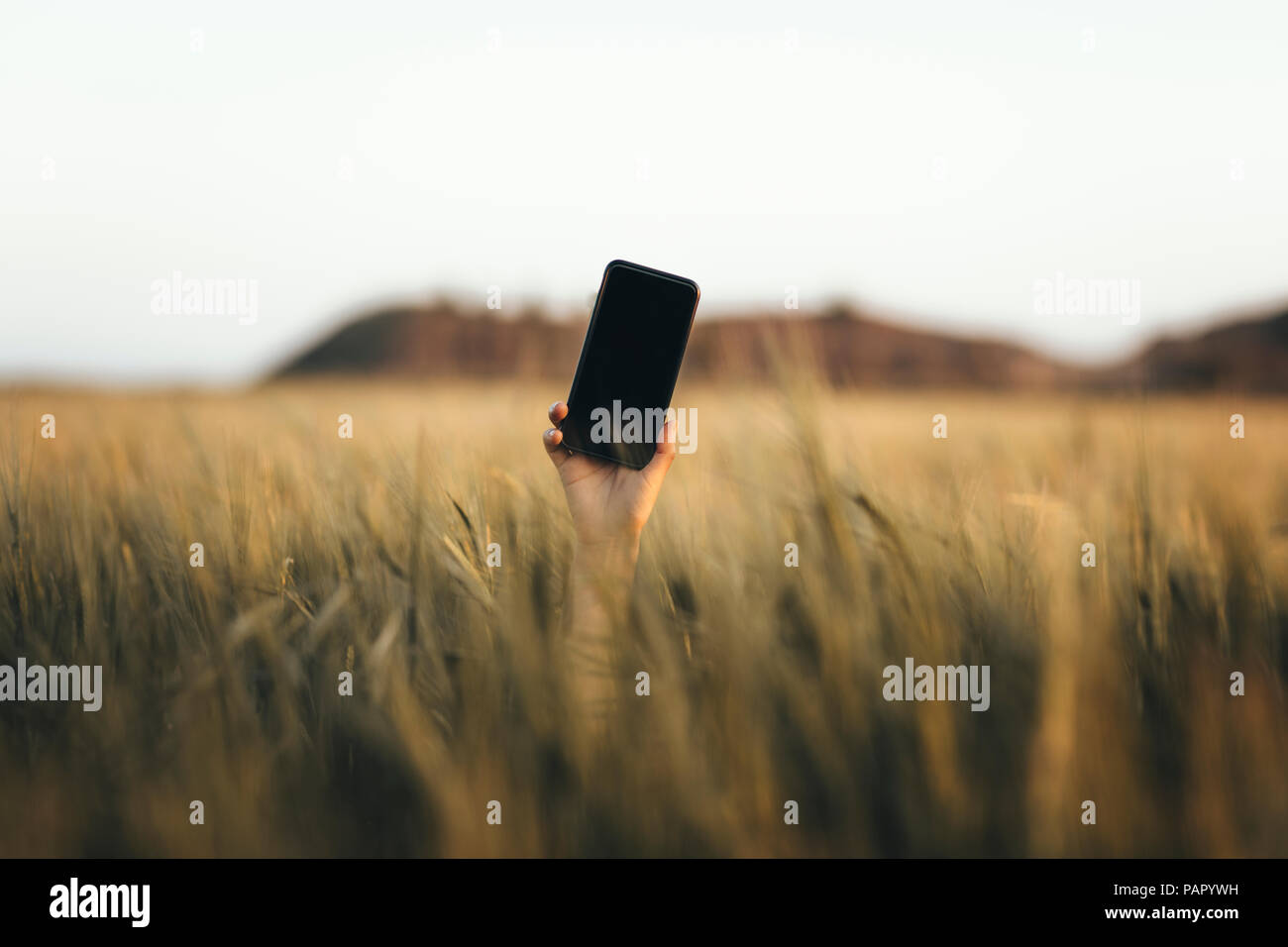 Hand reaching out hi-res stock photography and images - Alamy