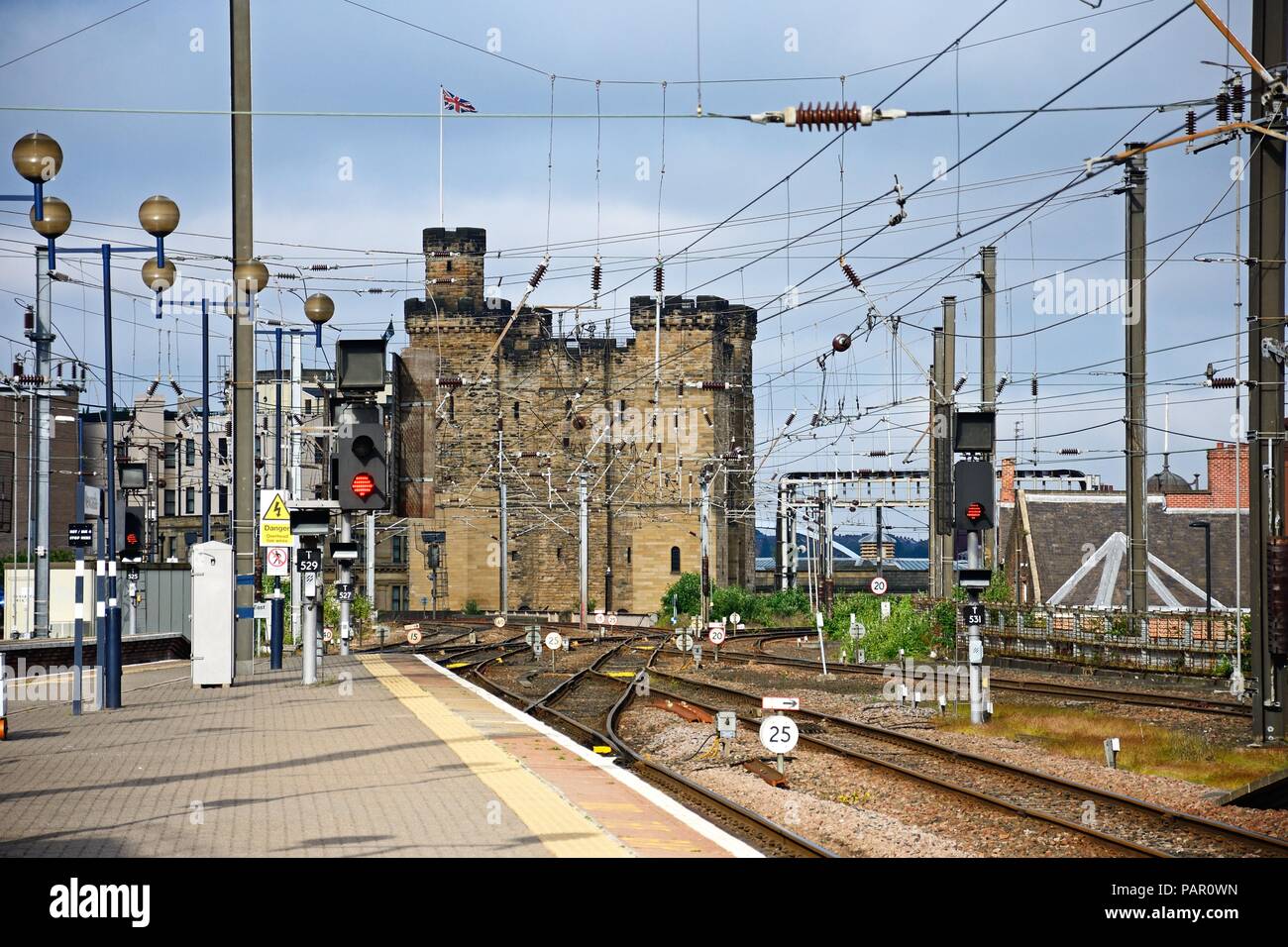 View along the railway tracks towards the Medieval castle keep ...