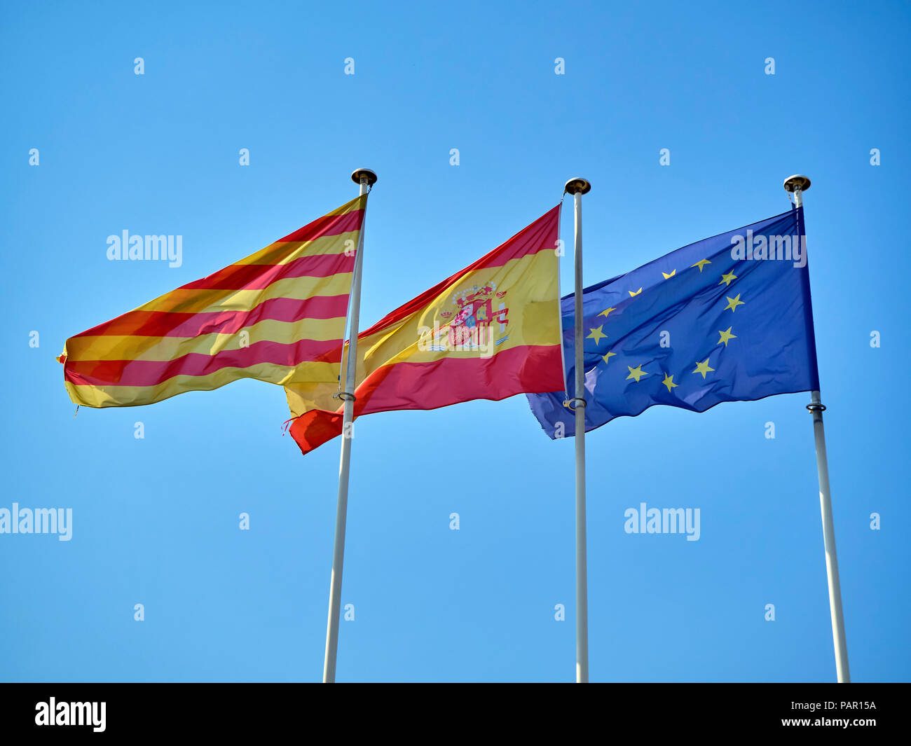Official flags of Catalonia, Spain and The European Union (EU) waving ...
