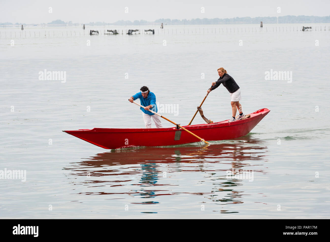 Man rowing traditional boat hi-res stock photography and images - Alamy