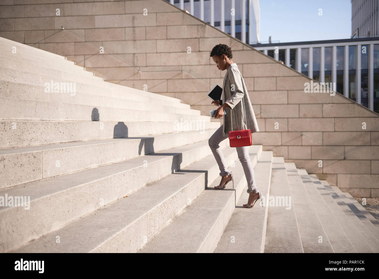 Walking up stairs hi-res stock photography and images - Alamy