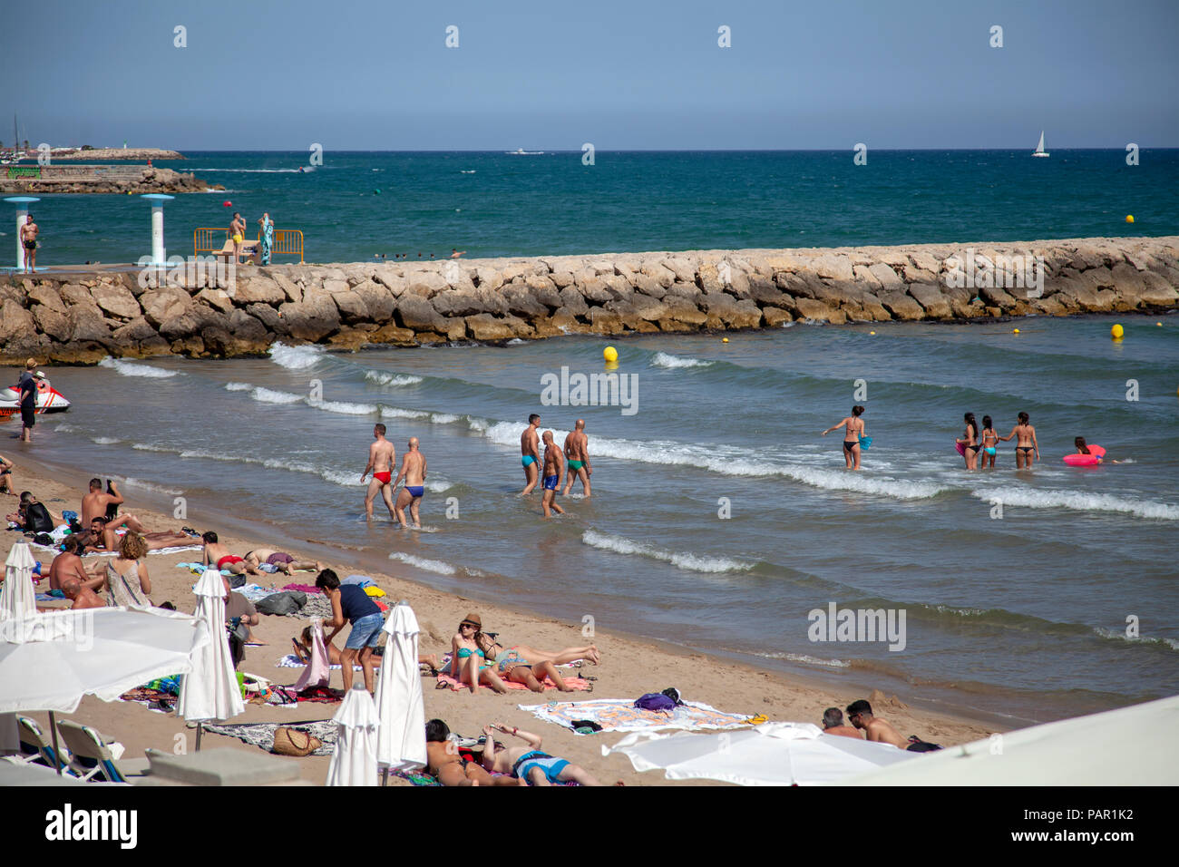 Bathers at Beach Bassa Redona in Sitges, Spain Stock Photo - Alamy