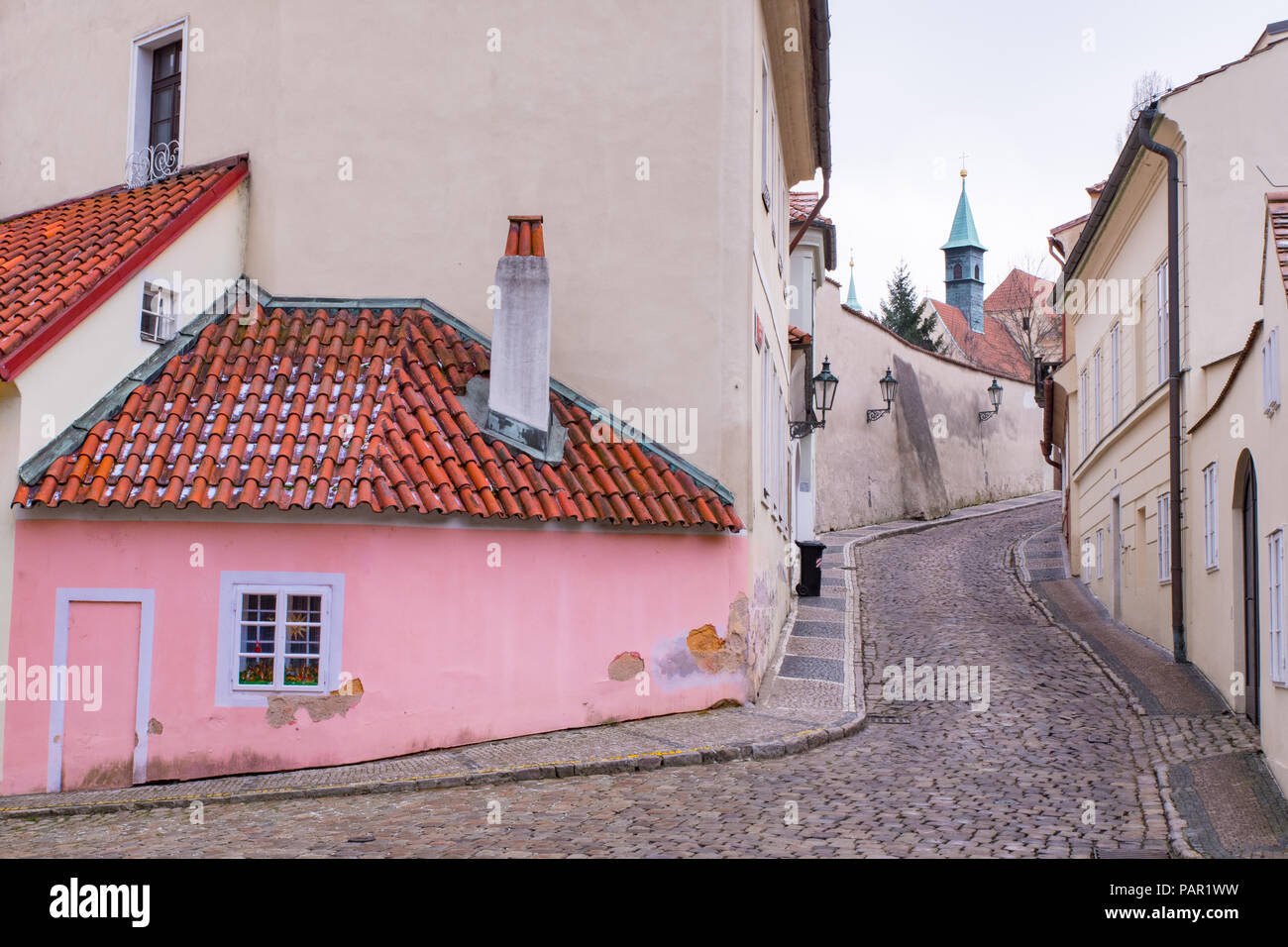 A pink corner house at the bottom of a cobbled hill in Novy Svet ...