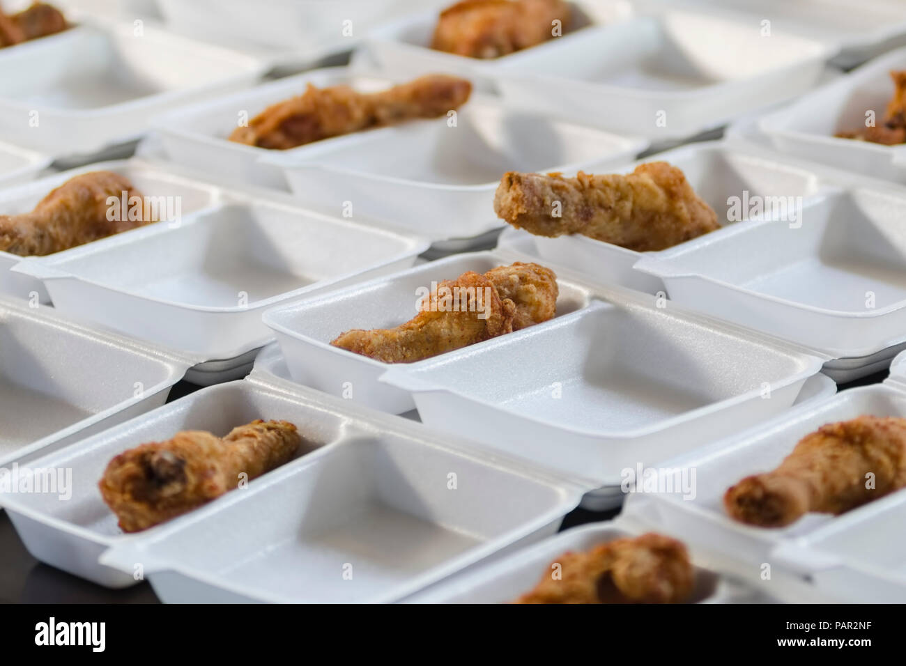 Ready-to-eat fried chickens on disposable styrofoam containers Stock ...