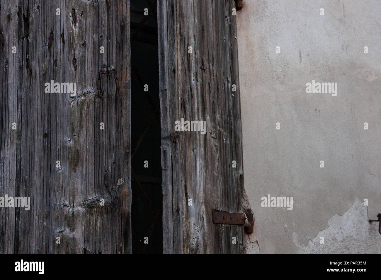 Slightly open antique wood window Stock Photo - Alamy