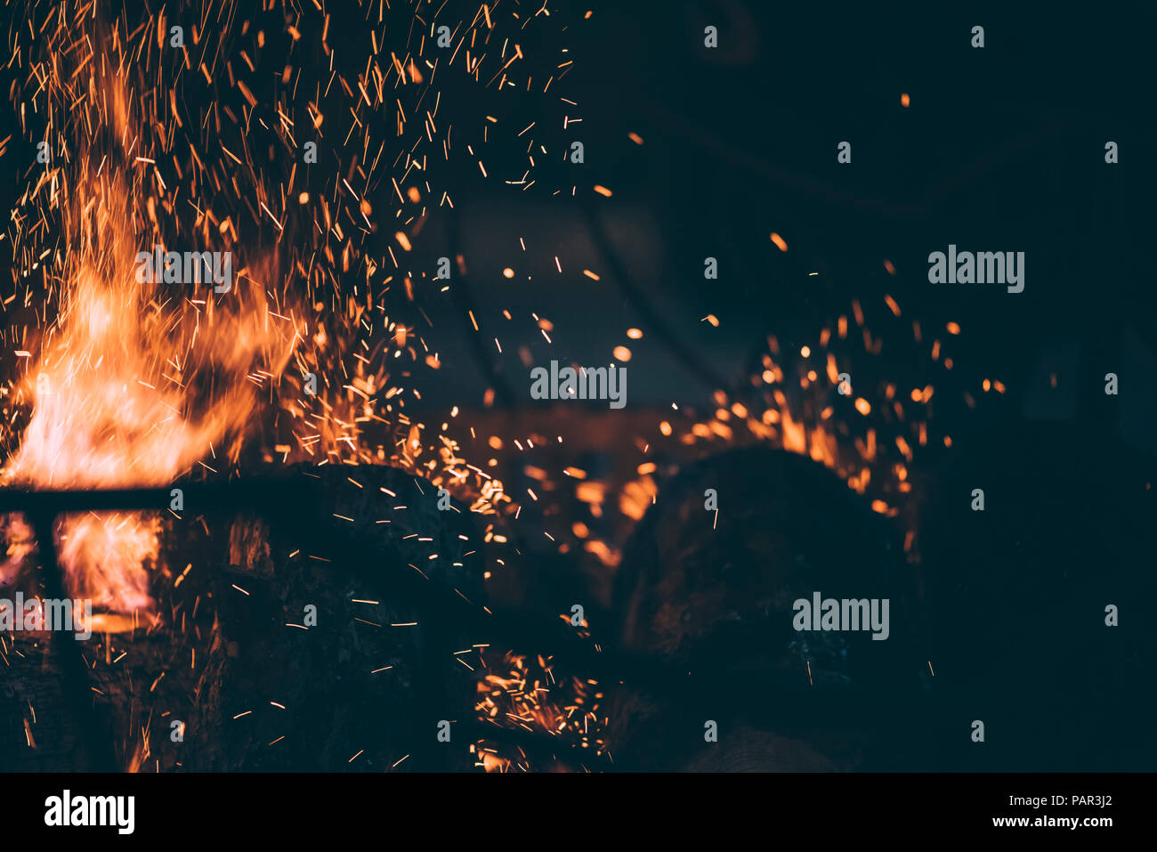 Beautiful bonfire burning in the camping area Stock Photo - Alamy