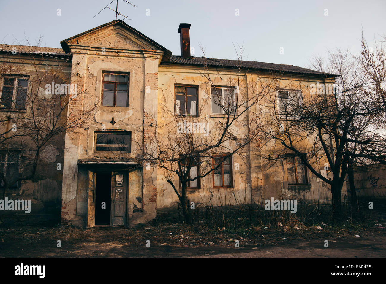 Front facade of an old abandoned building Stock Photo - Alamy