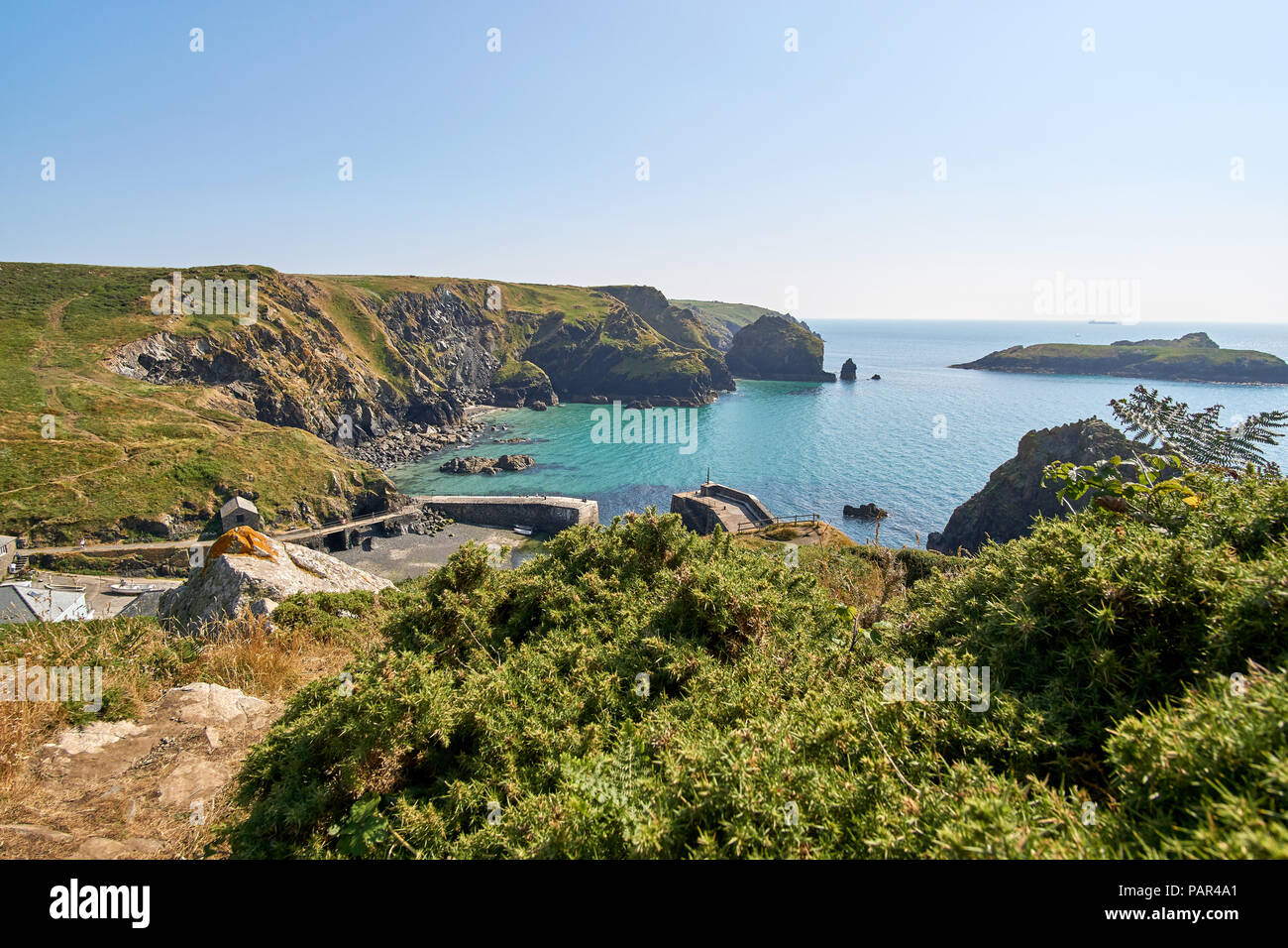 View down to the harbour at Mullion Cove with Mullion Island, towards ...
