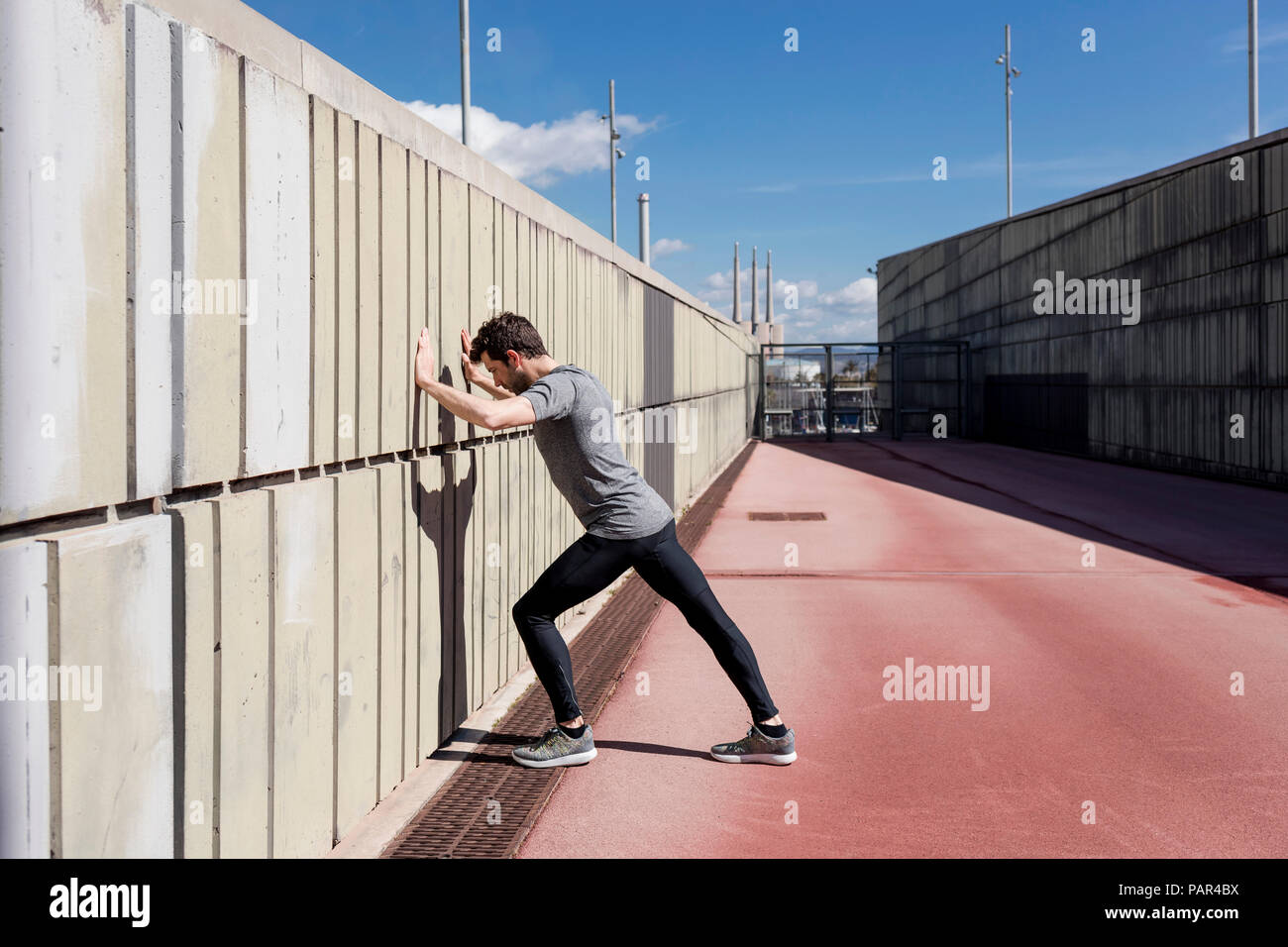 Sportive man exercising wall hi-res stock photography and images - Alamy