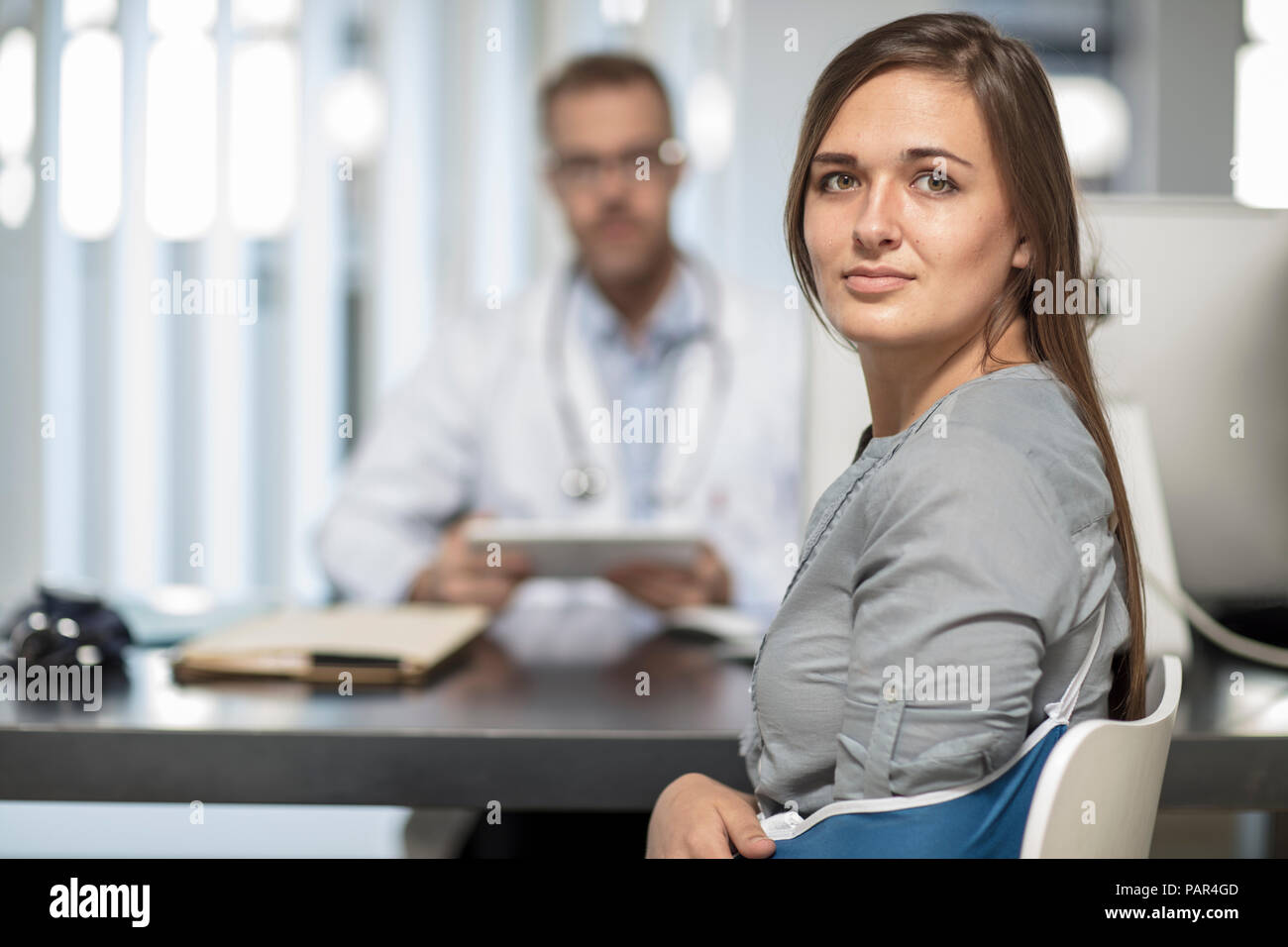 Doctor and patient in medical practice Stock Photo - Alamy