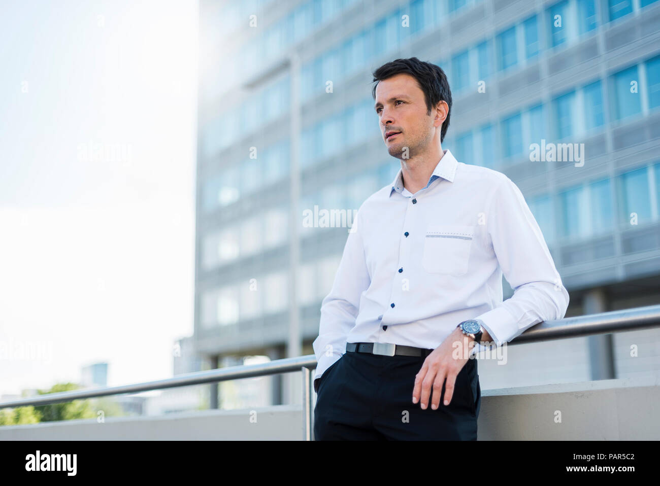 Man leaning railings hi-res stock photography and images - Alamy