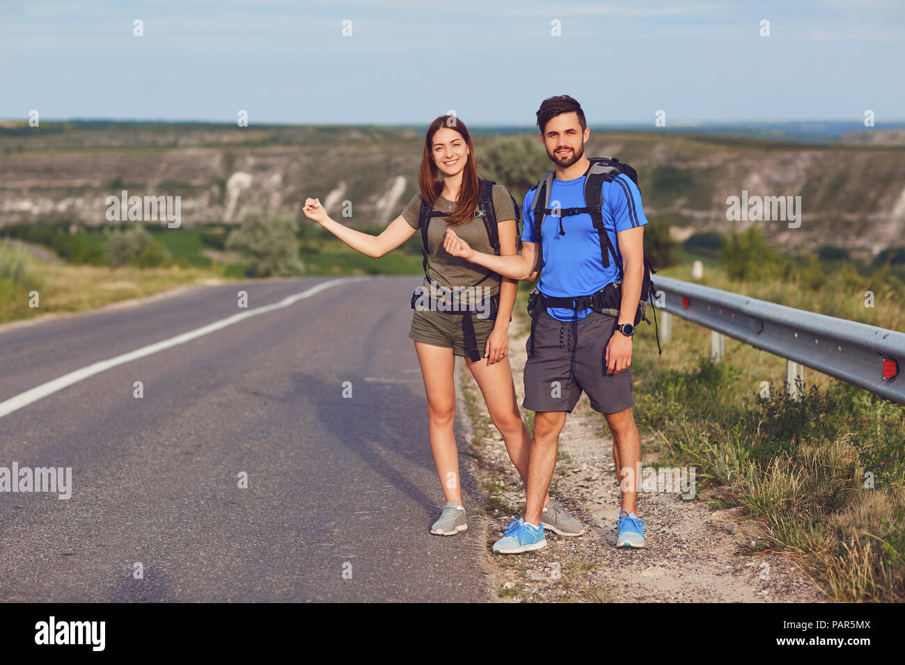 Two people hitchhiking hi-res stock photography and images - Alamy